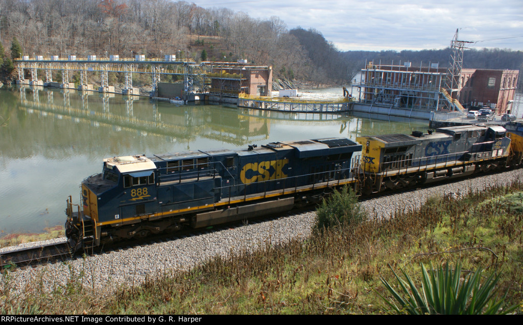 CSXT 888 wb by Reusens Dam undergoing a little rehab work